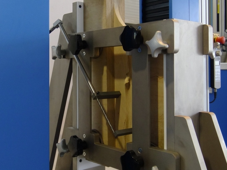 testing wood in tension, compression and bending.